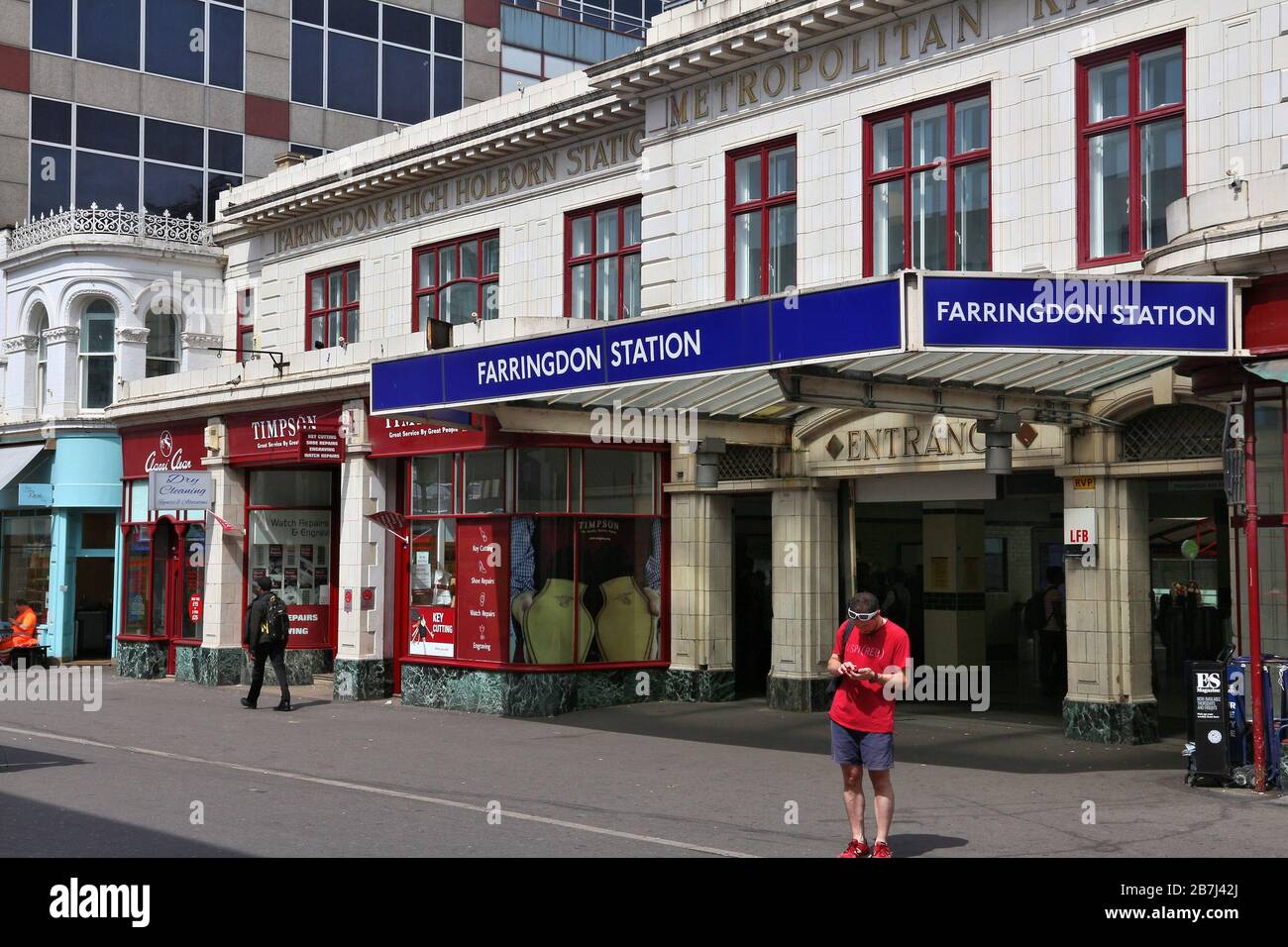 LONDON, UK - JULY 9, 2016: People walk by Farringdon Station in London ...