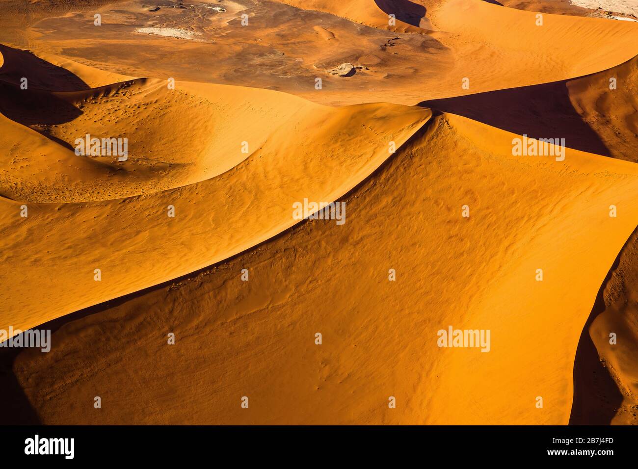 Sand dunes of Namib desert from aircraft on Skeleton coast in Namibia ...