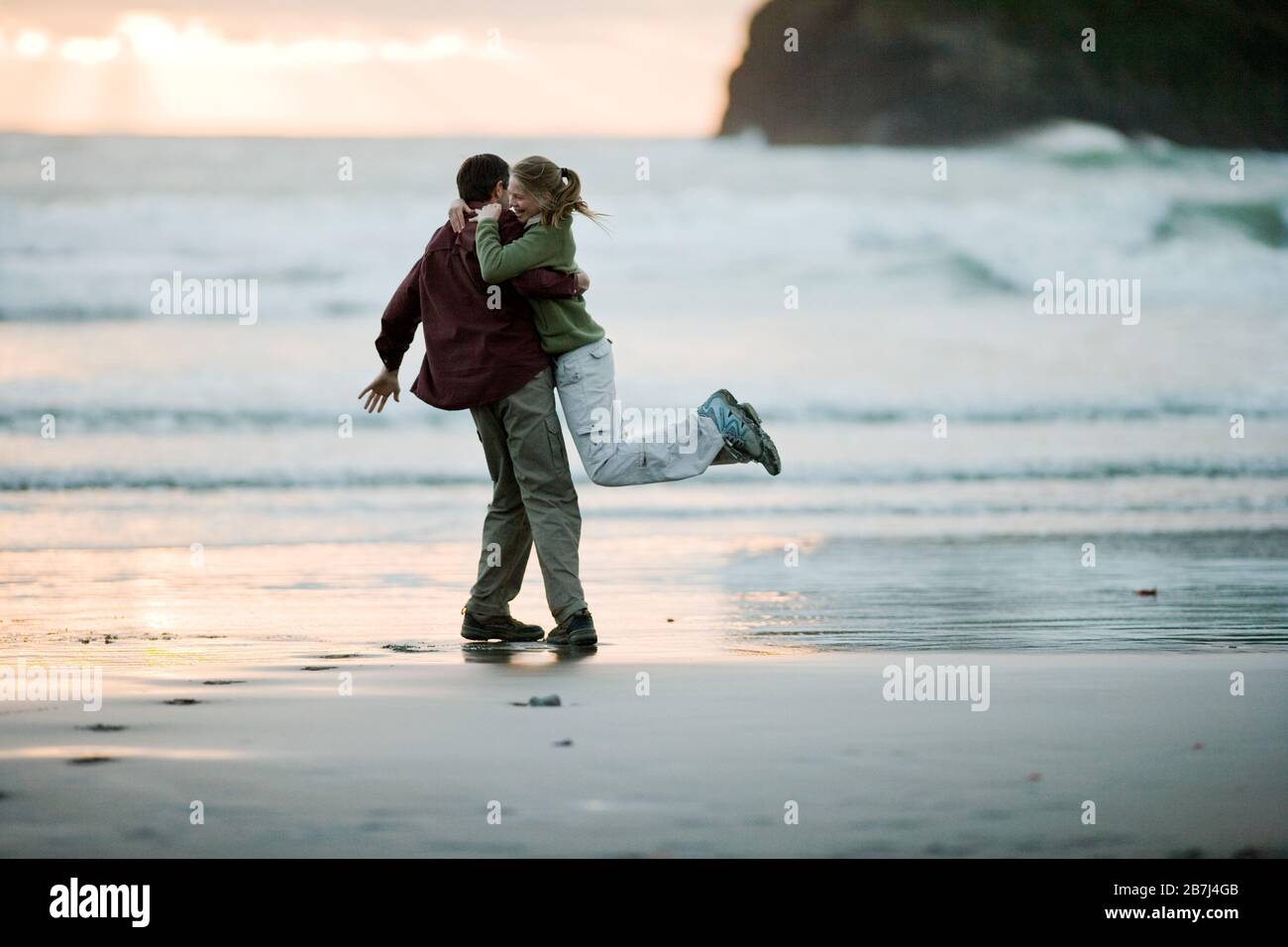 Man is lifting and spinning hi-res stock photography and images - Alamy