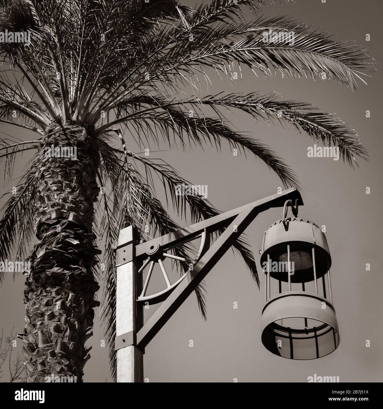 A theme of the Old West with lantern street lighting and wagon wheel ...