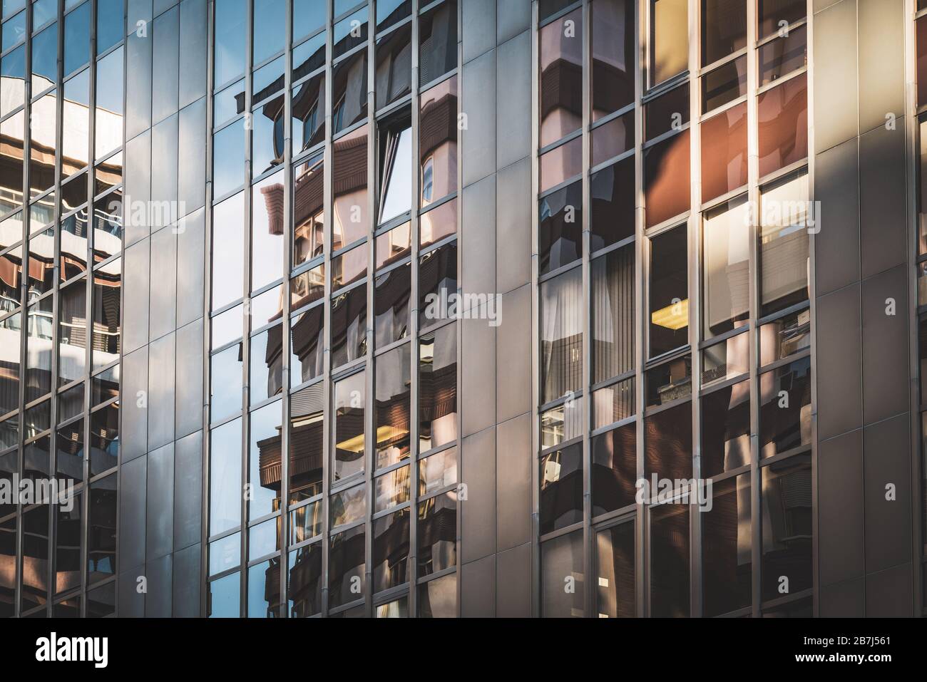 Modern facade of an office building with rows of windows hi-res stock ...