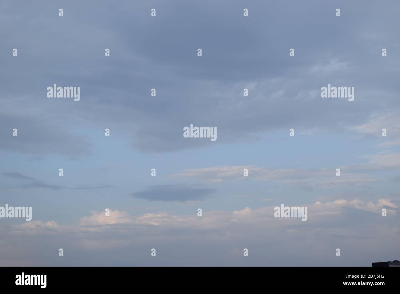 Beautiful view of sky with clouds covering the sun Stock Photo - Alamy