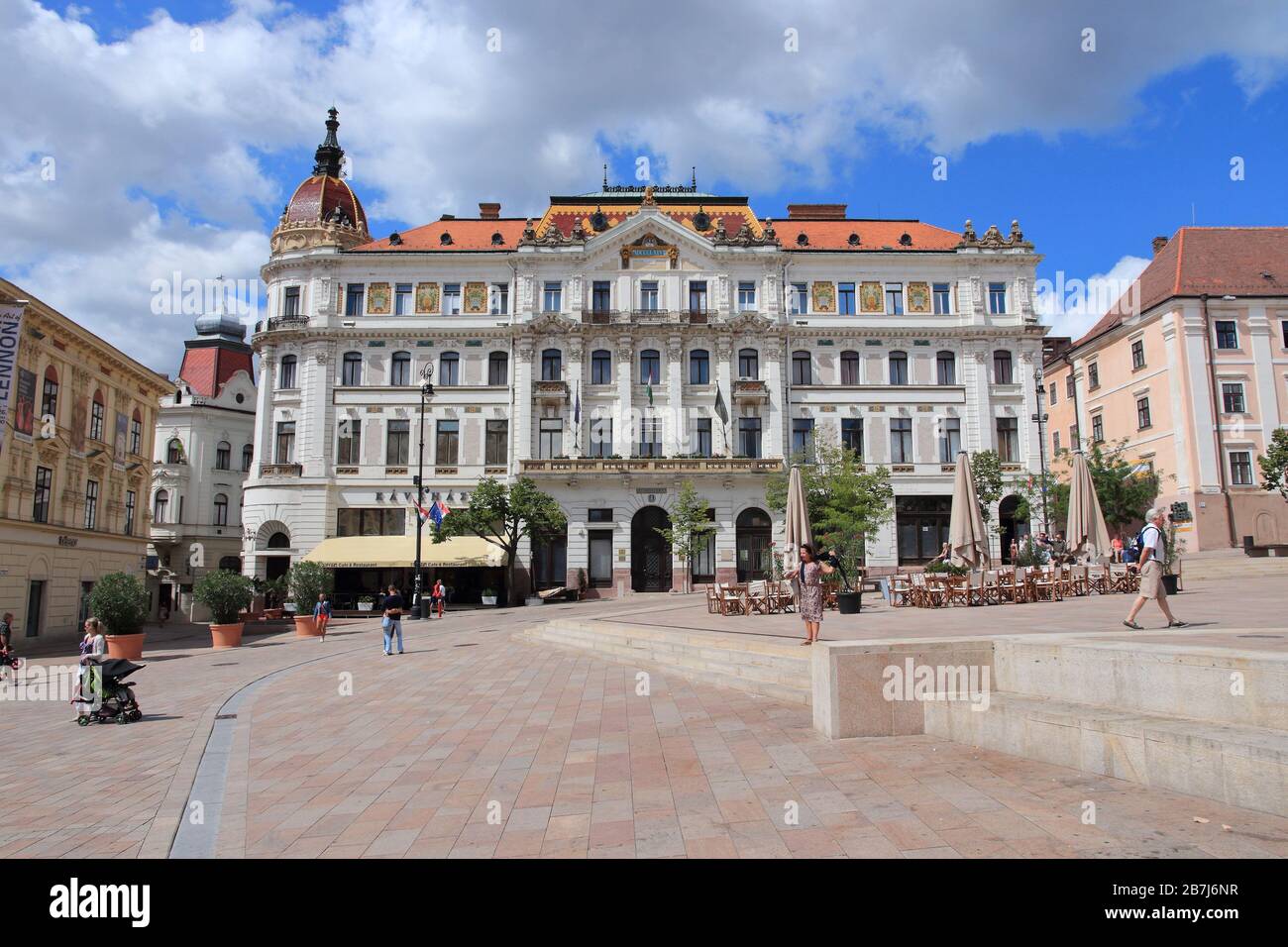 PECS, HUNGARY - AUGUST 12, 2012: People visit Old town of Pecs, Hungary ...