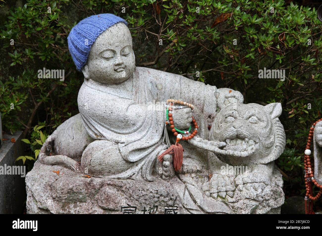 MIYAJIMA, JAPAN - APRIL 21, 2012: Jizo statue at Daishouin Buddhist ...