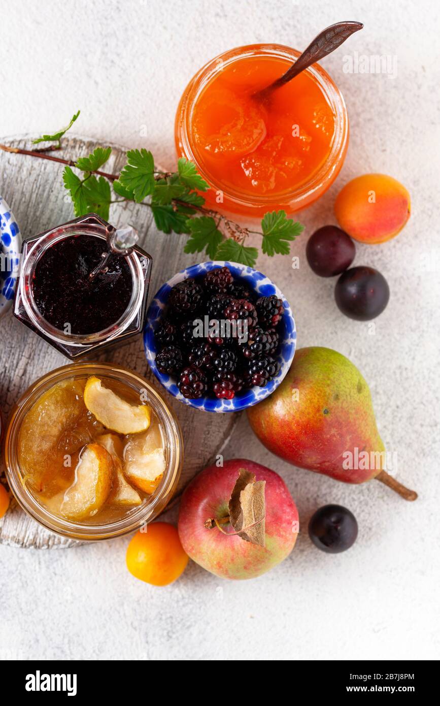 Assortment of different jams in jars Stock Photo - Alamy