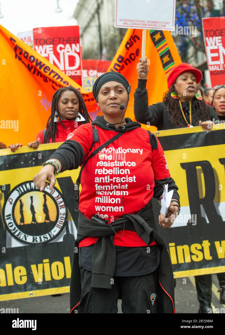 Female protesters with banners at the Million Women Rise demonstration ...