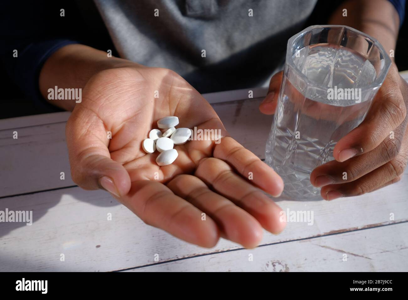 Man mouth pill hi-res stock photography and images - Alamy