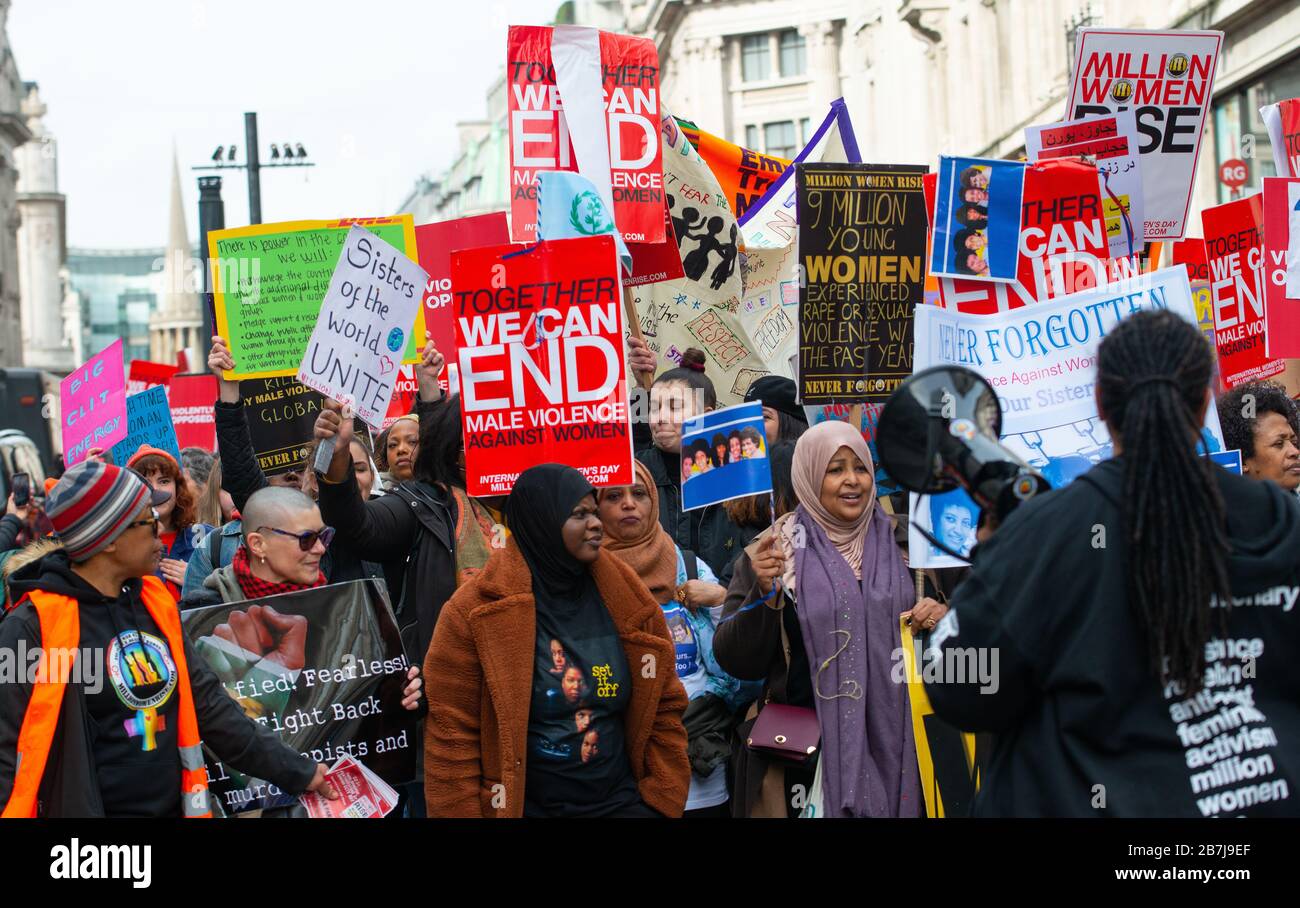 Female protesters with banners at the Million Women Rise demonstration ...