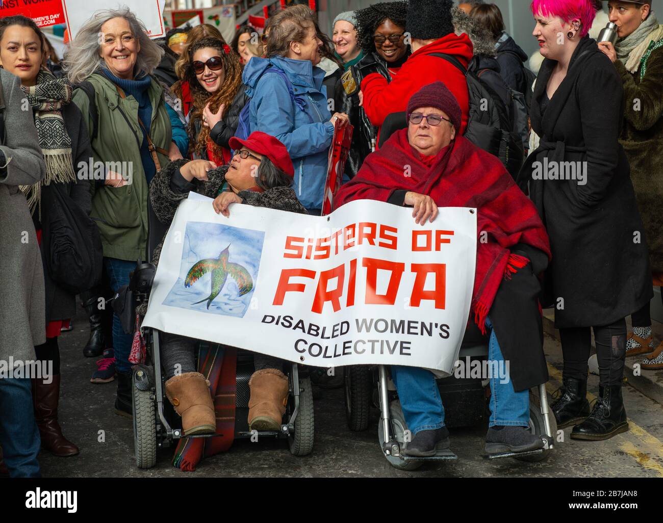 Female protesters with banners at the Million Women Rise demonstration ...