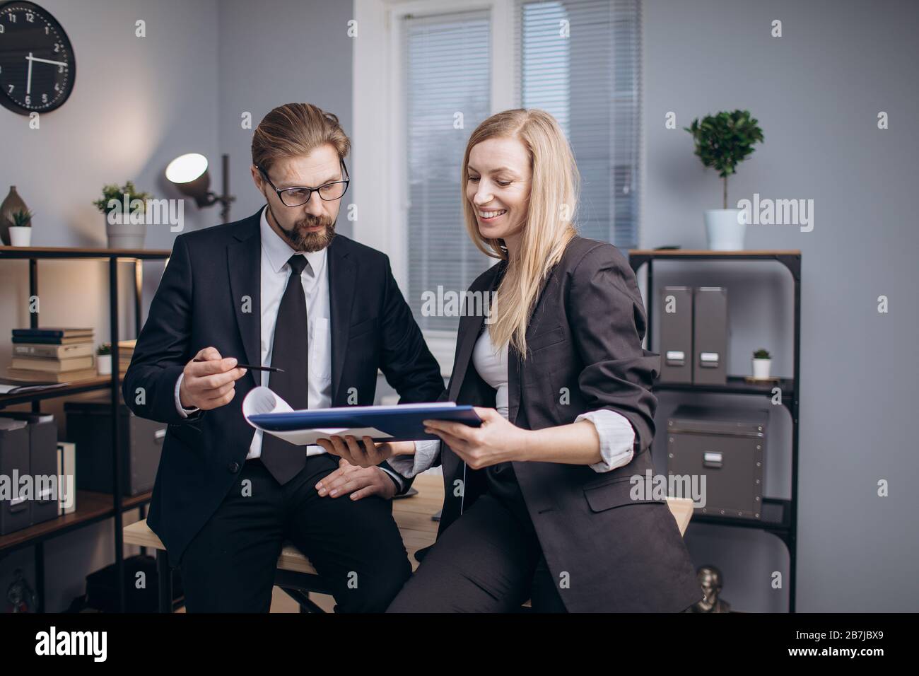 Two business partners process hi-res stock photography and images - Alamy