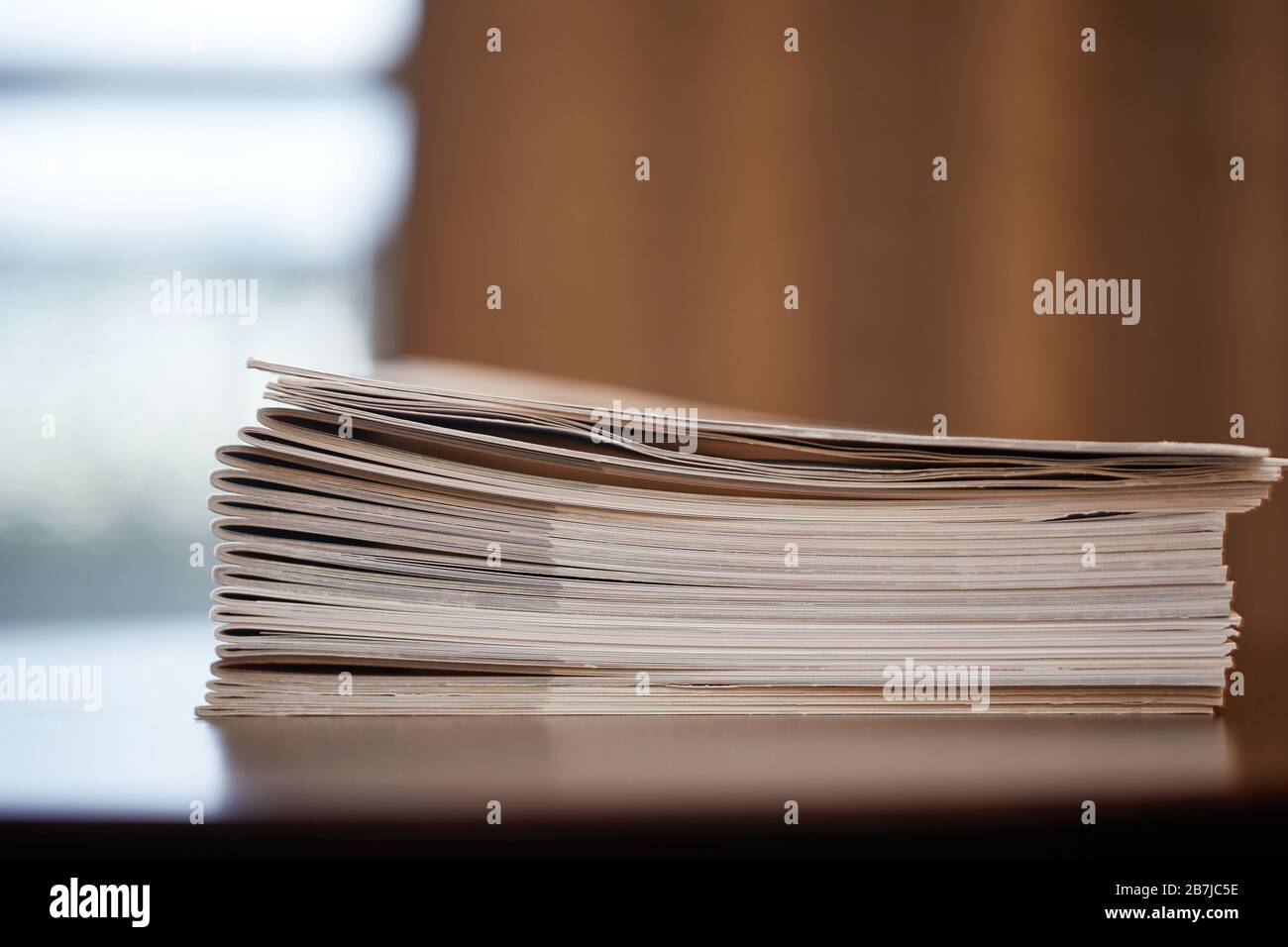 Magazines in a pile Stock Photo - Alamy