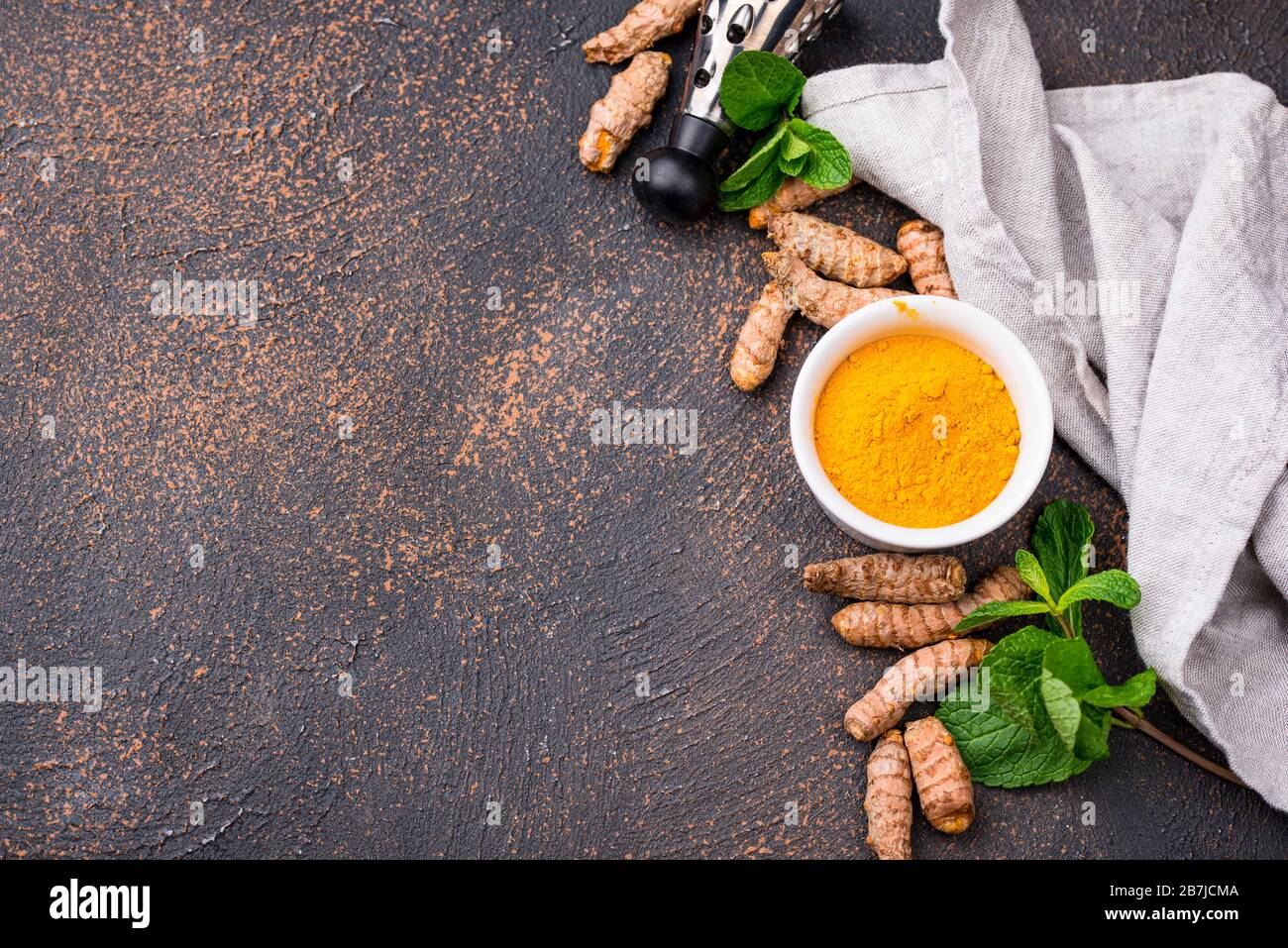 Turmeric powder and curcuma root Stock Photo - Alamy