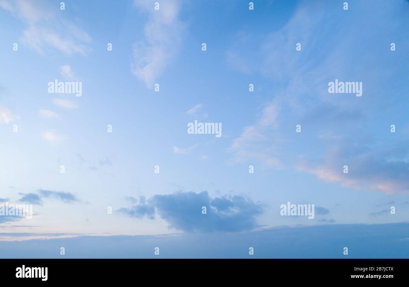 Beautiful sky with stretched clouds during twilight Stock Photo - Alamy