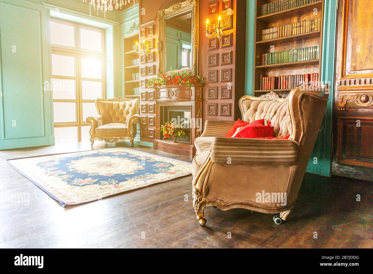 Luxury classic interior of home library. Sitting room with bookshelf ...