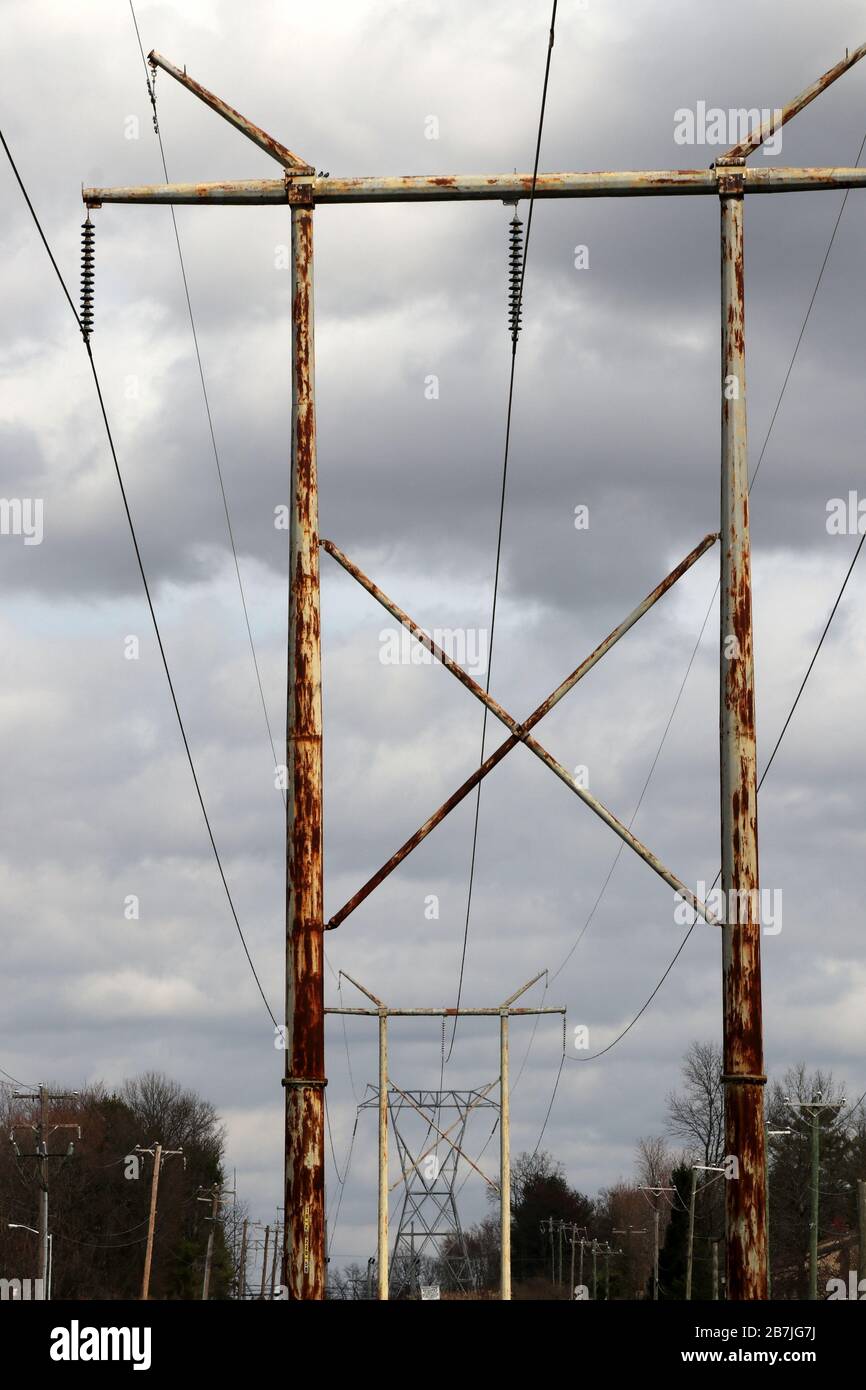 The tall utility poles bring electricity in to our homes Stock Photo ...