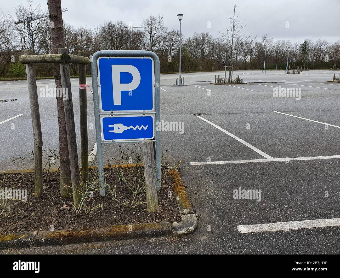 Signs showing that here are Electric Charger stands for electric car ...