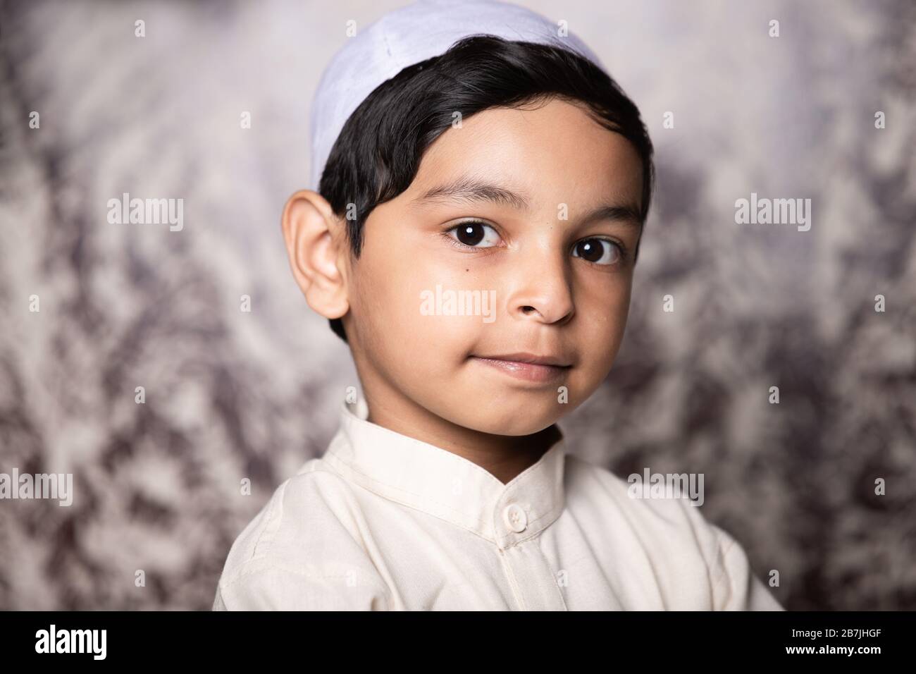 Muslim Child Portrait Looking Towards to Camera and Giving Expression ...