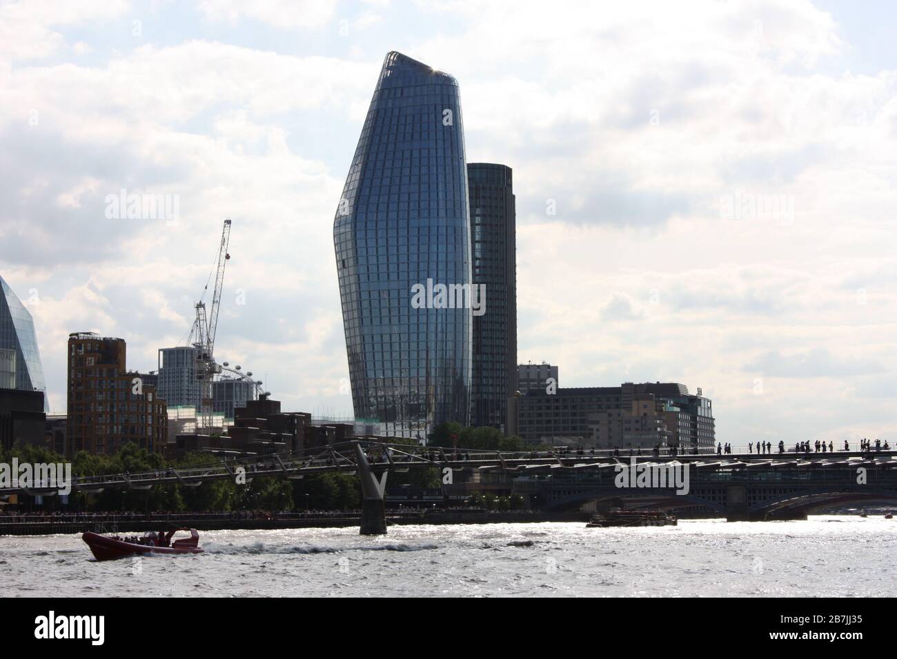 london and its historic and modern buildings along the thames river in ...