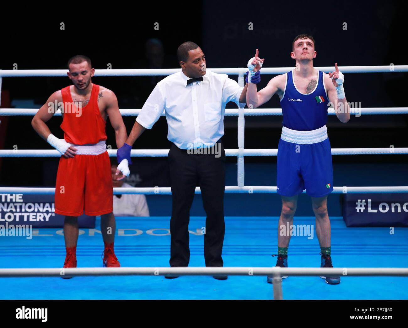 Ireland's Brendan Irvine (blue) celebrates defeating Hungary's Istvan ...