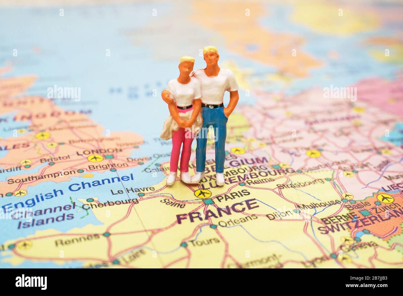 Figures of the couple on a map of France Stock Photo - Alamy