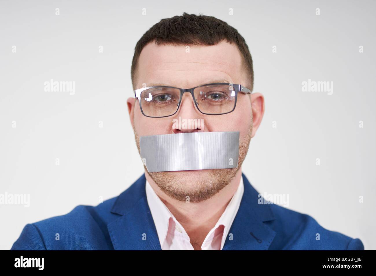 Man tape over mouth hi-res stock photography and images - Alamy