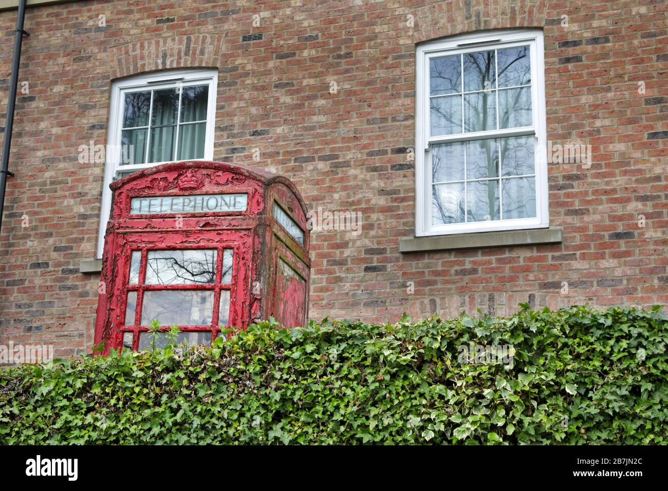 A disused Telephone Box sitiuated in a Garden. York, UK Stock Photo - Alamy