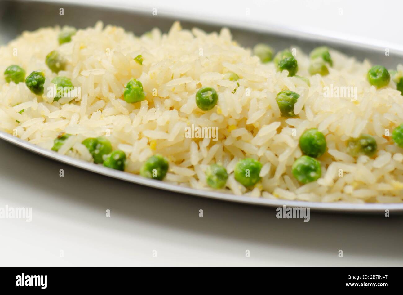 Egg fried rice served on the metal tray, an addition to an Indian or ...