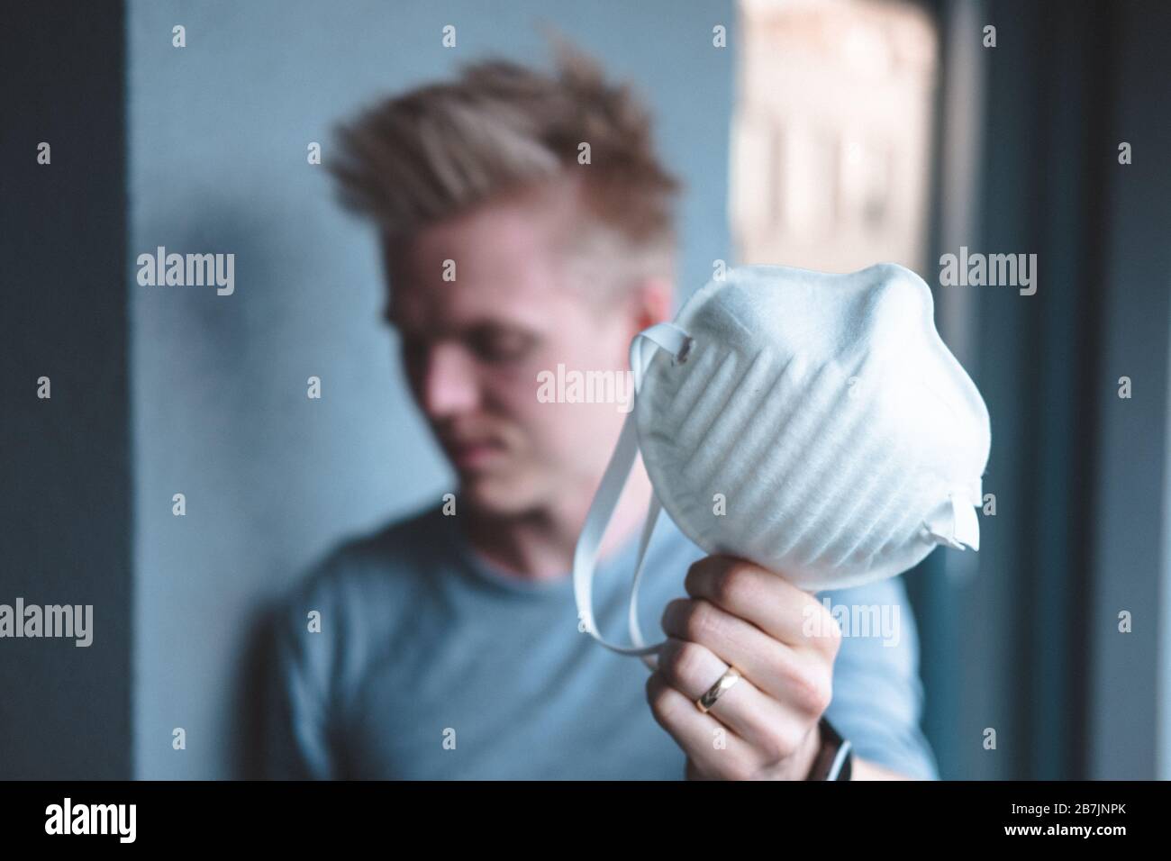 Man wearing FFP3 face mask respirator against flu Stock Photo - Alamy