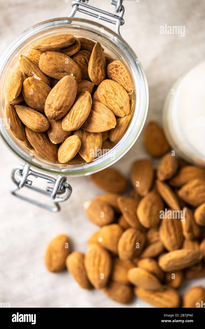 Dried almonds nuts in jar. Top view Stock Photo - Alamy