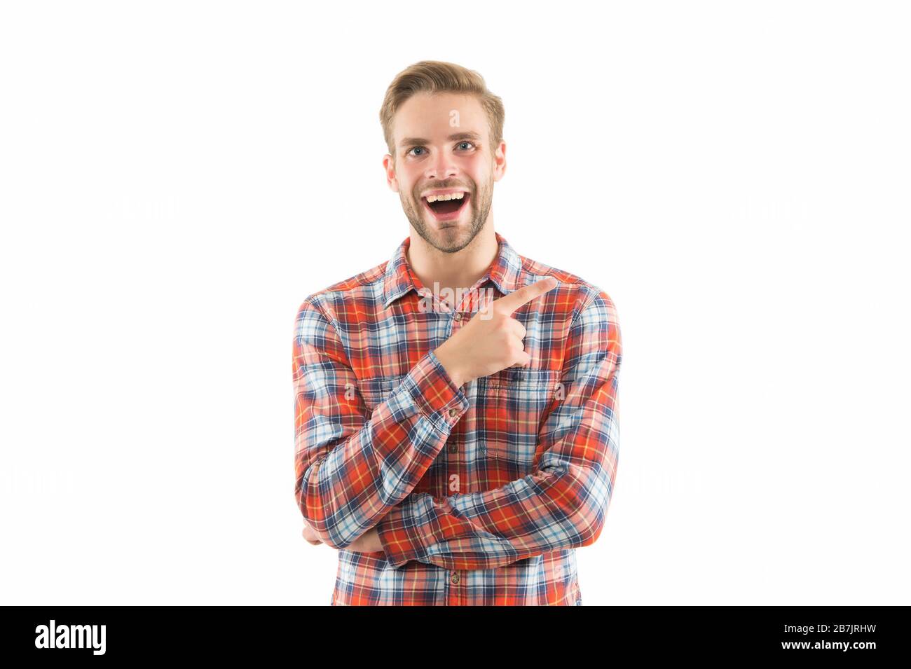 Attracting customers to buy his product. Happy guy promoting product ...