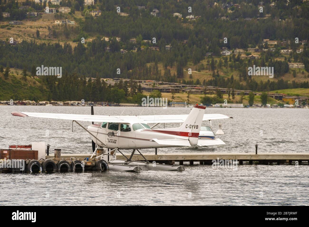 Single engine float plane alongside a jetty in Kelowna, BC, Canada ...