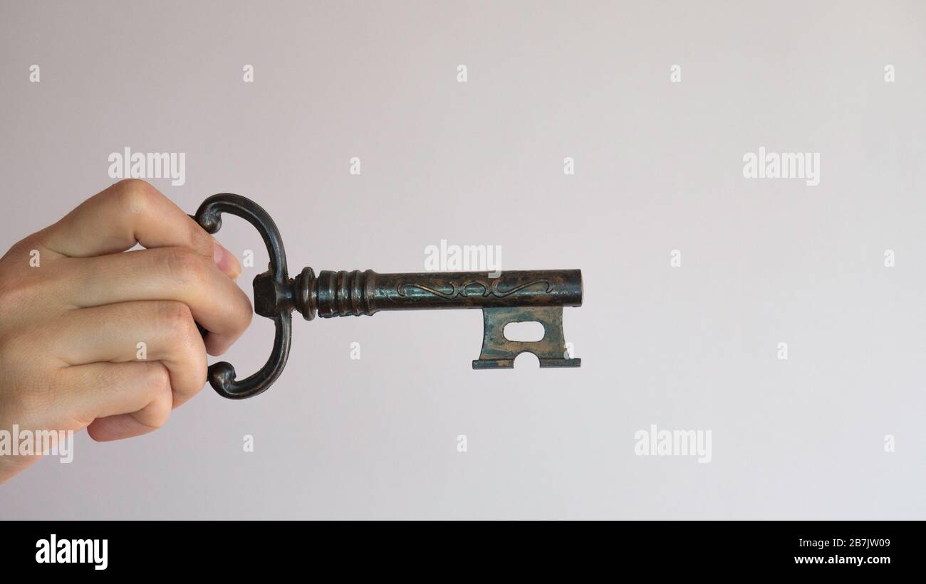 Corkscrew for opening bottles in the form of a key in a woman's right ...