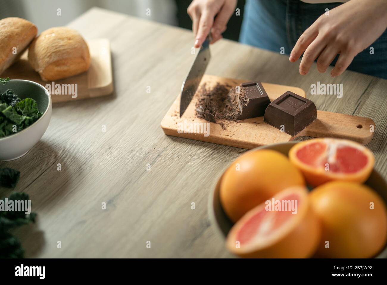 Cutting chocolate hi-res stock photography and images - Alamy