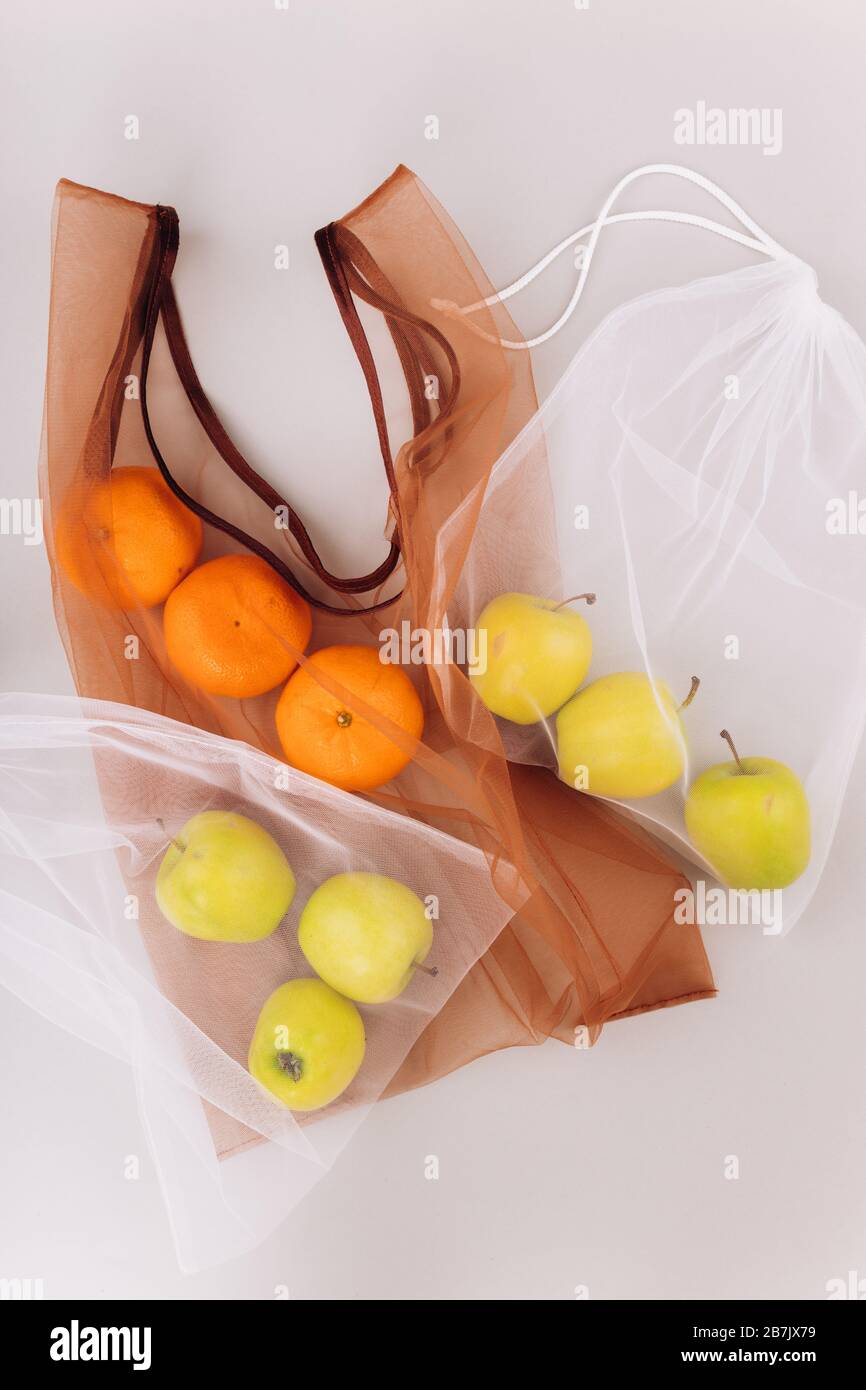 Eco packs. Eco bag with apples. Purchase without harm to nature in anti ...