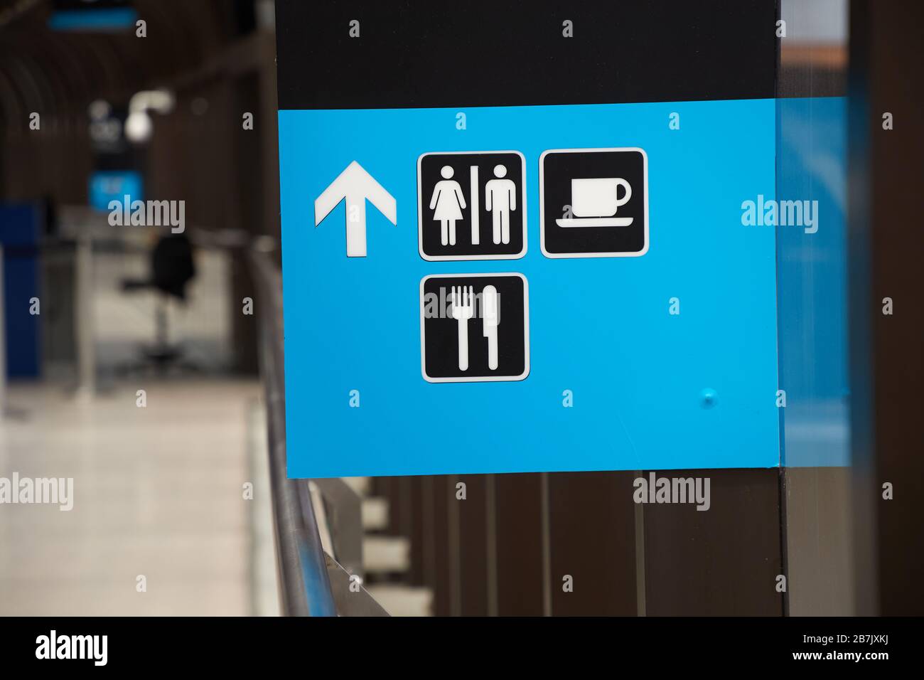 Toilet sign in a building Stock Photo - Alamy