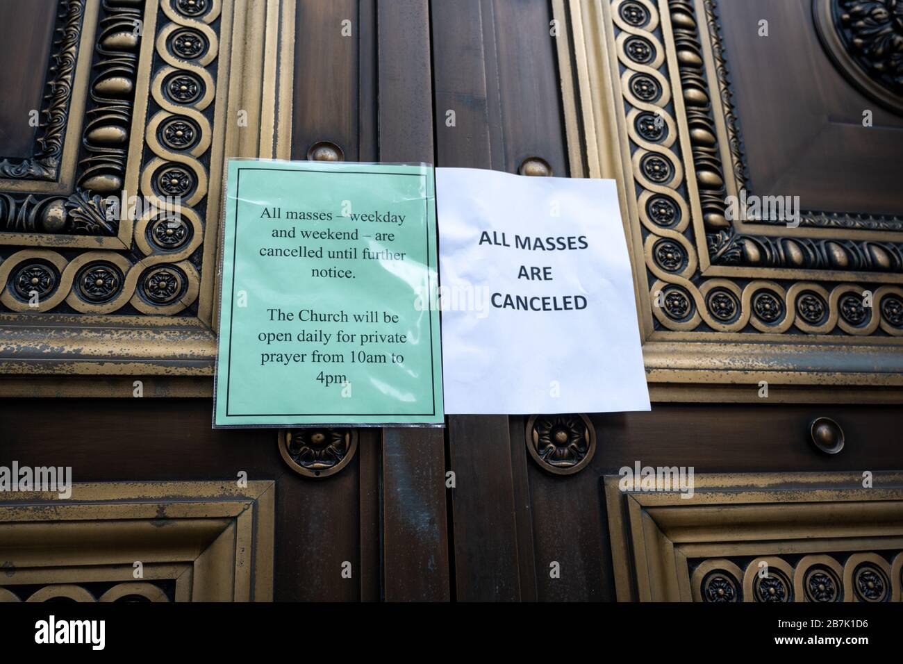 New York, USA, 16 March 2020. Signs in the front of St. Ignatius Loyola ...