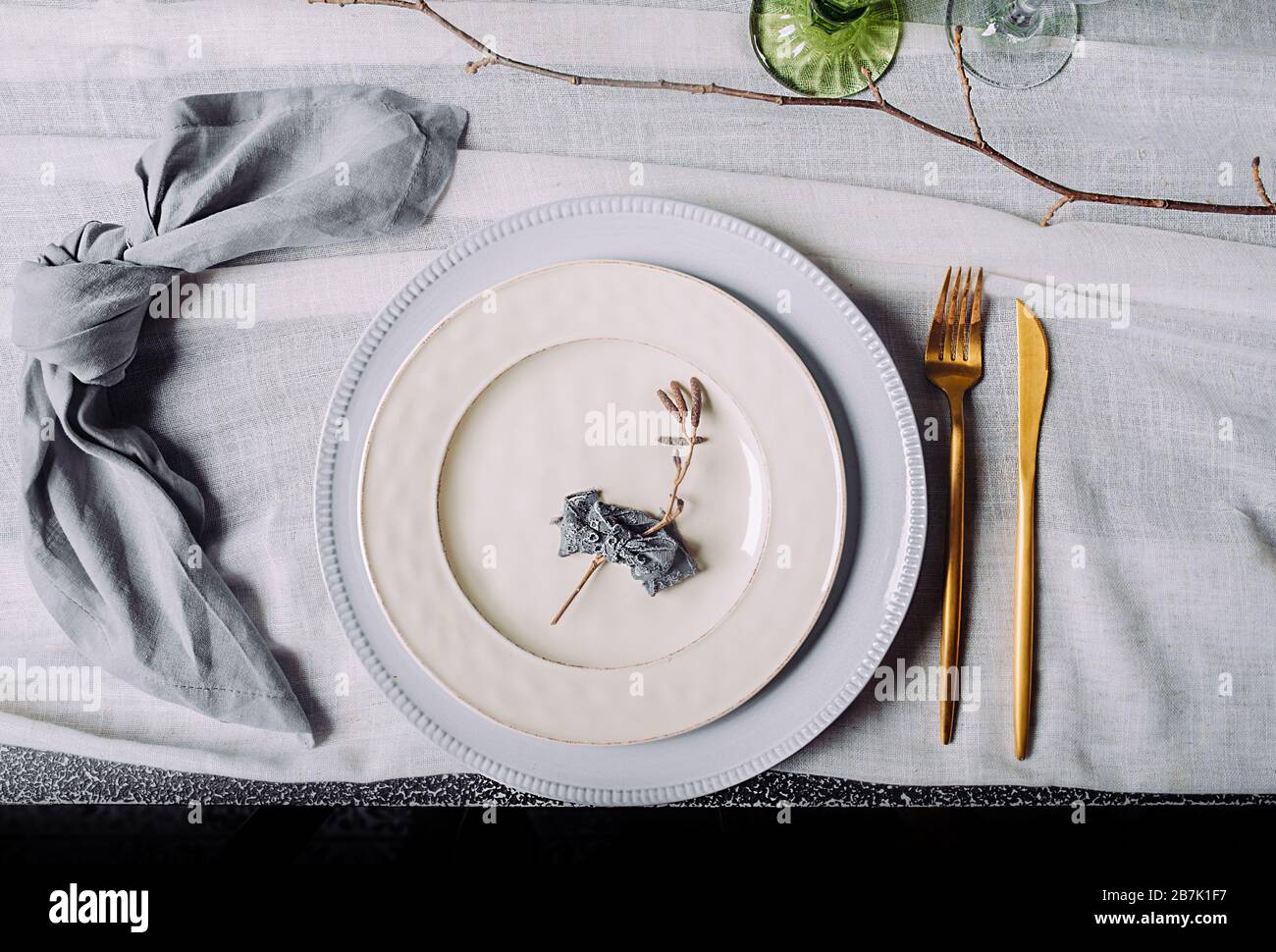 Eco-friendly natural table setting. Two white vintage plates with a ...