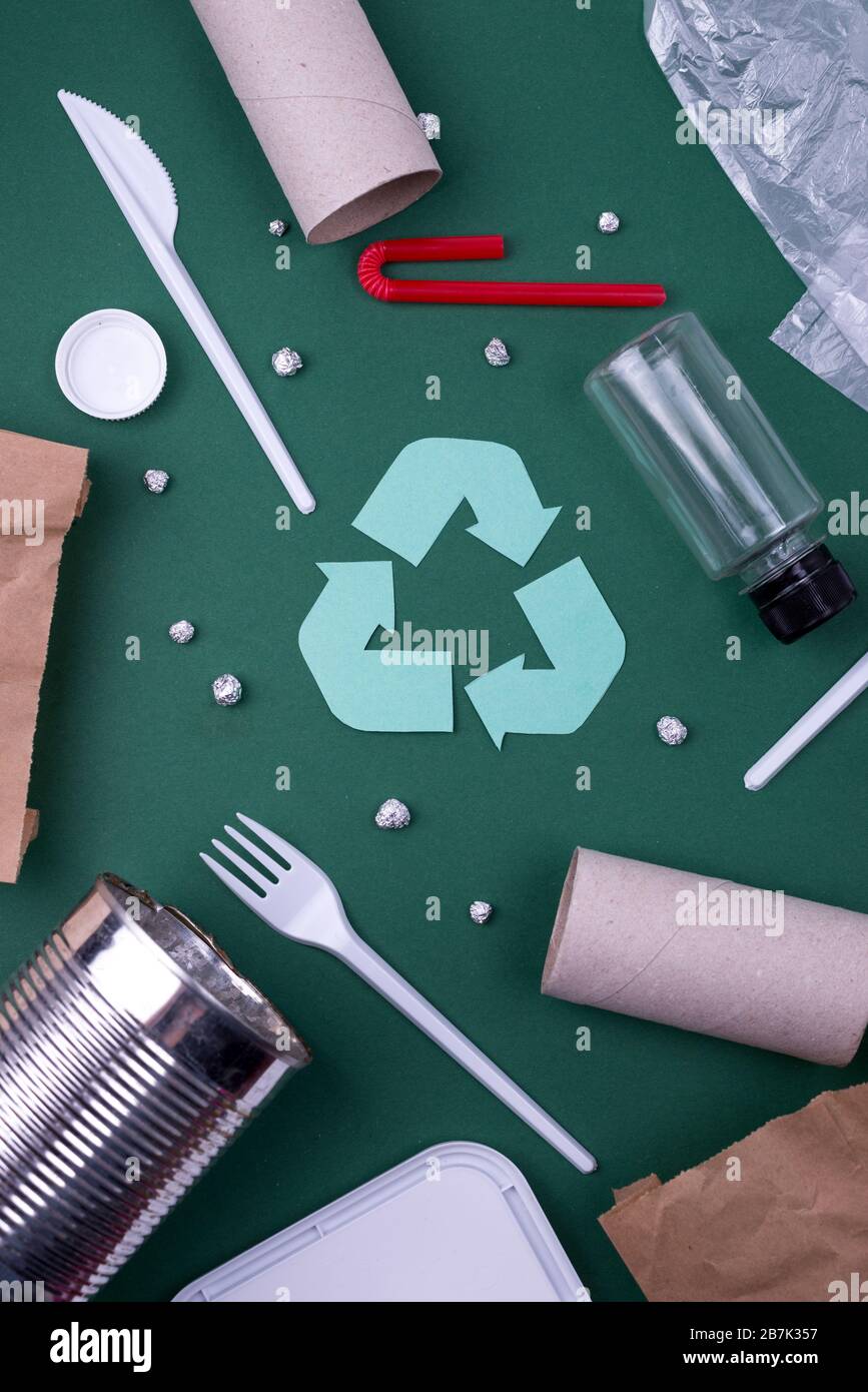 Reuse reduce recycle flat lay concept with plastic, paper, and ...