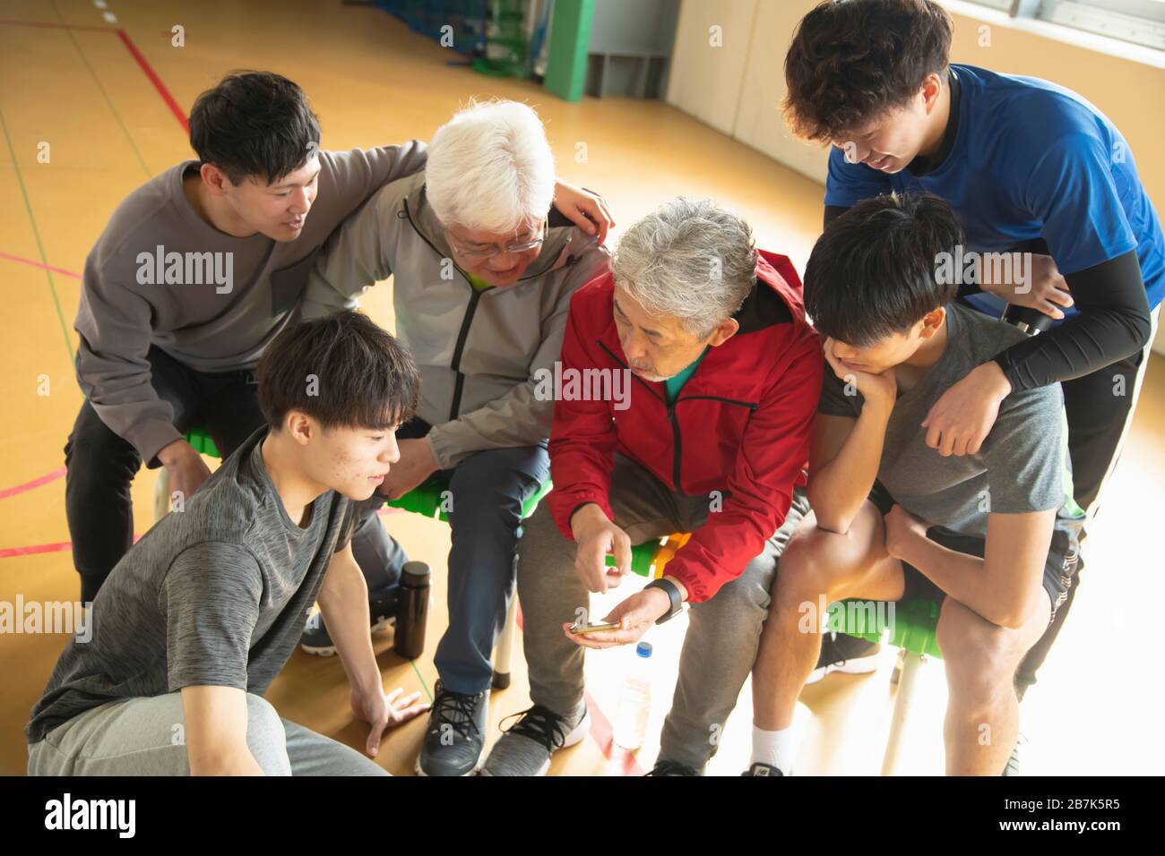 Senior and young people talking with smile Stock Photo - Alamy