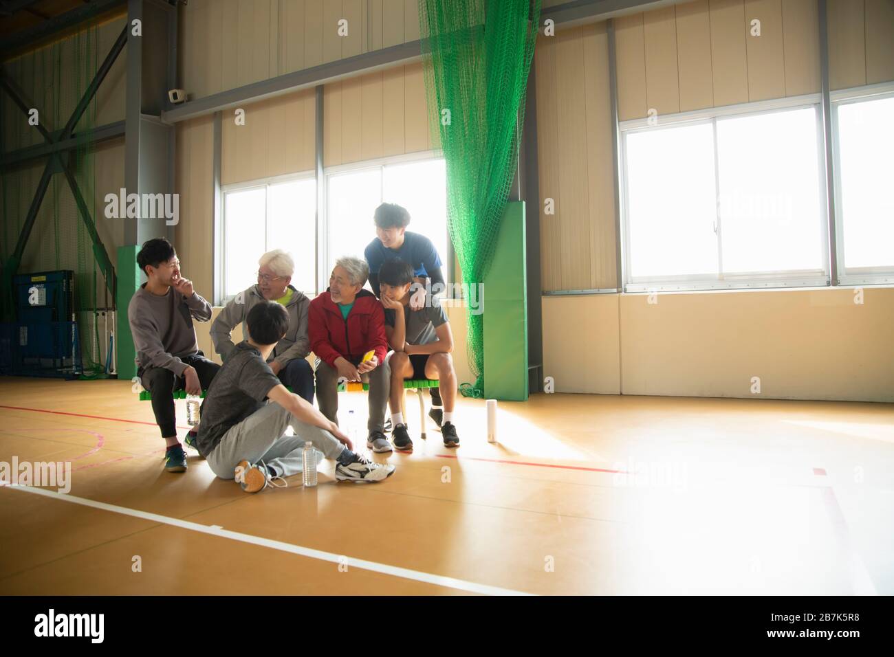 Senior and young people talking with smile Stock Photo - Alamy