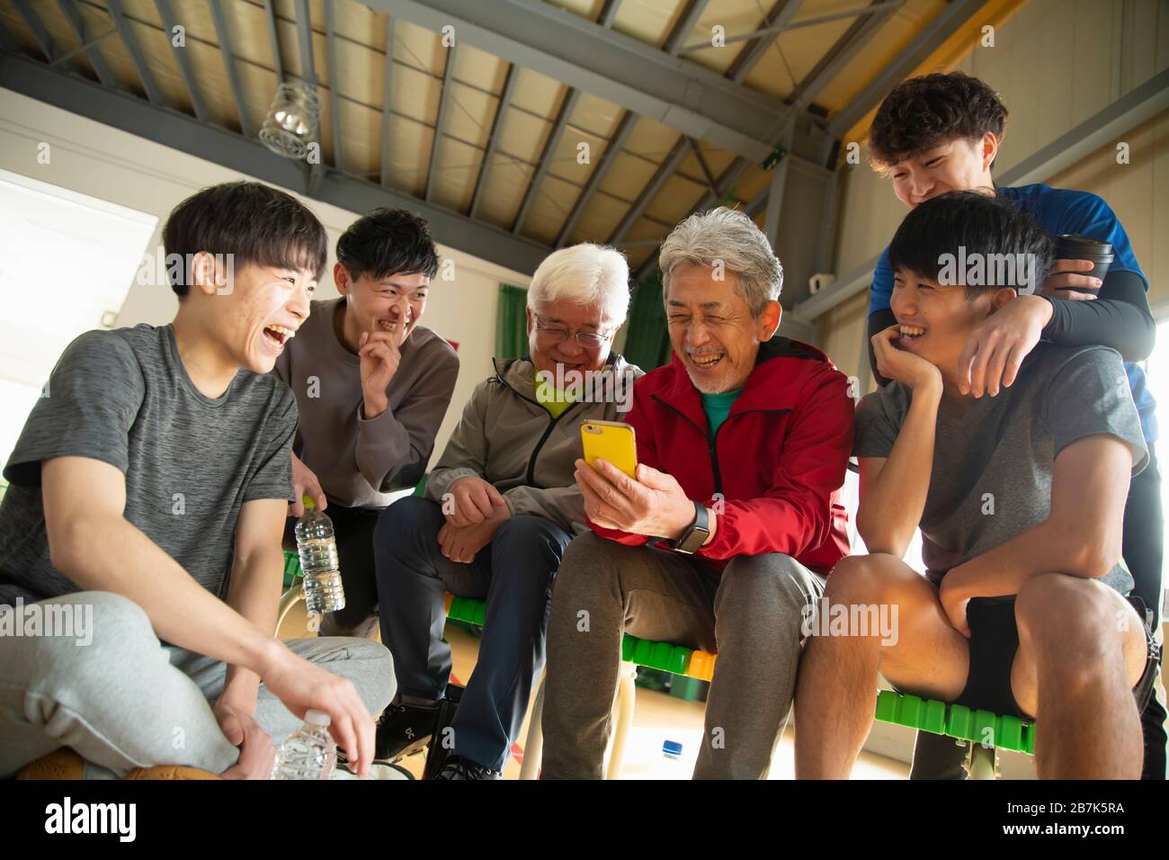 Senior and young people talking with smile Stock Photo - Alamy