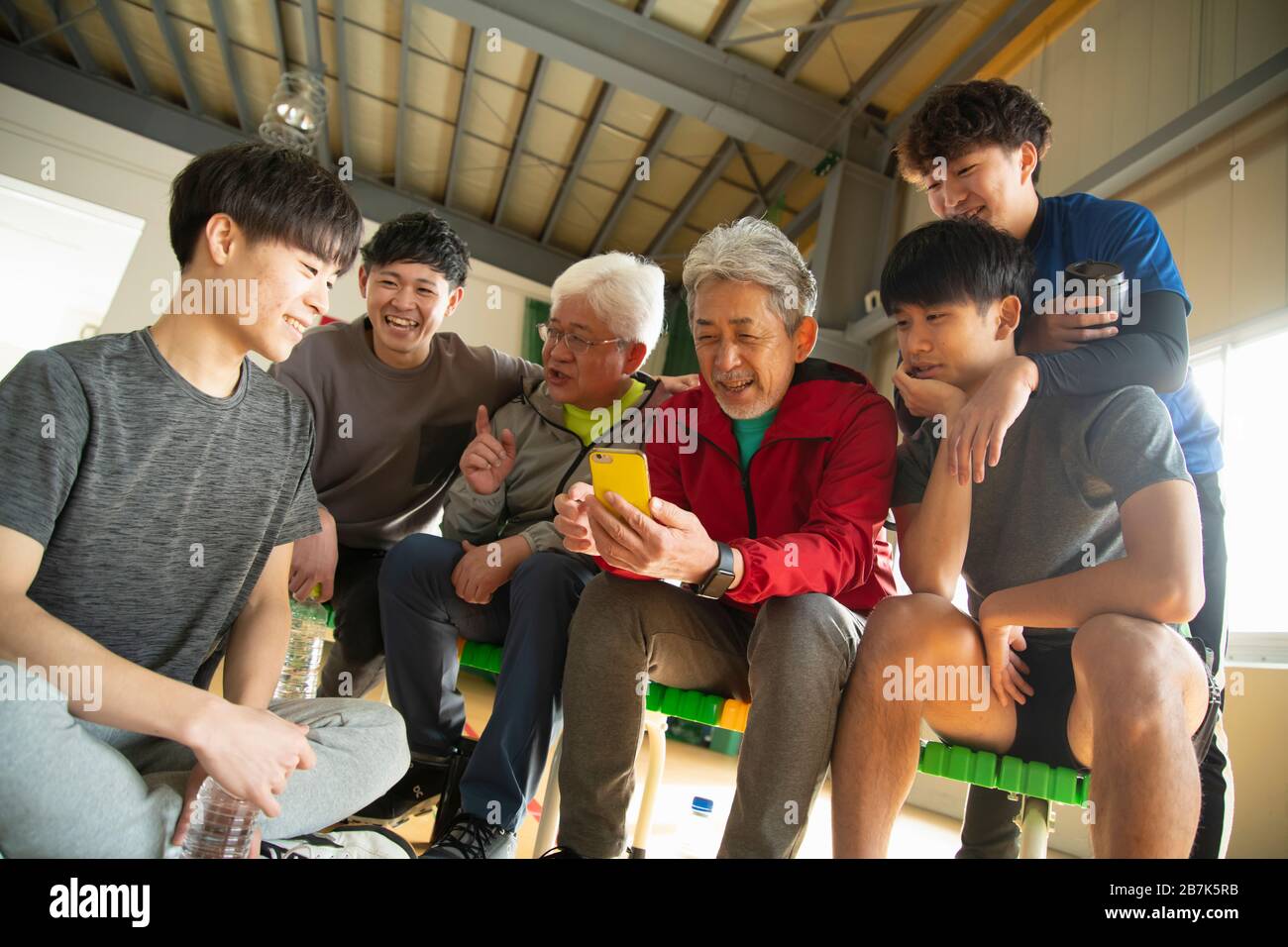 Senior and young people talking with smile Stock Photo - Alamy