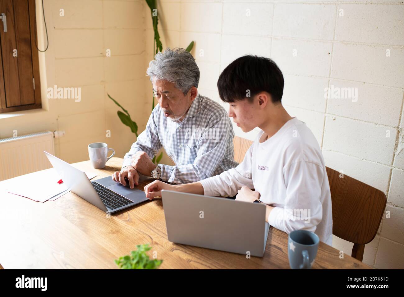 Computer elderly teenager two hi-res stock photography and images - Alamy