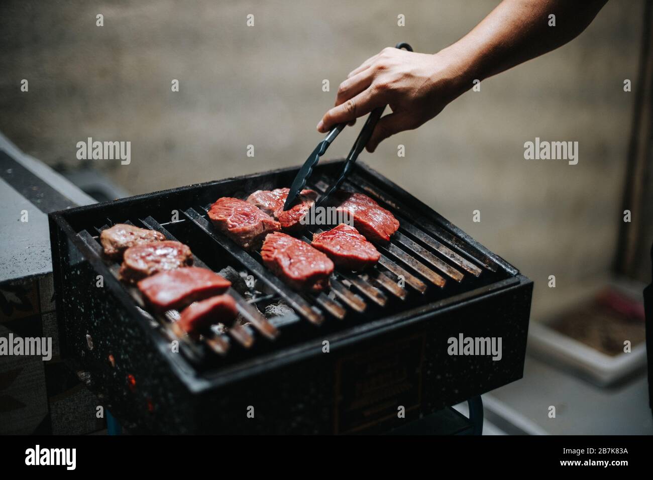 raw meat on a barbecue grill Stock Photo - Alamy