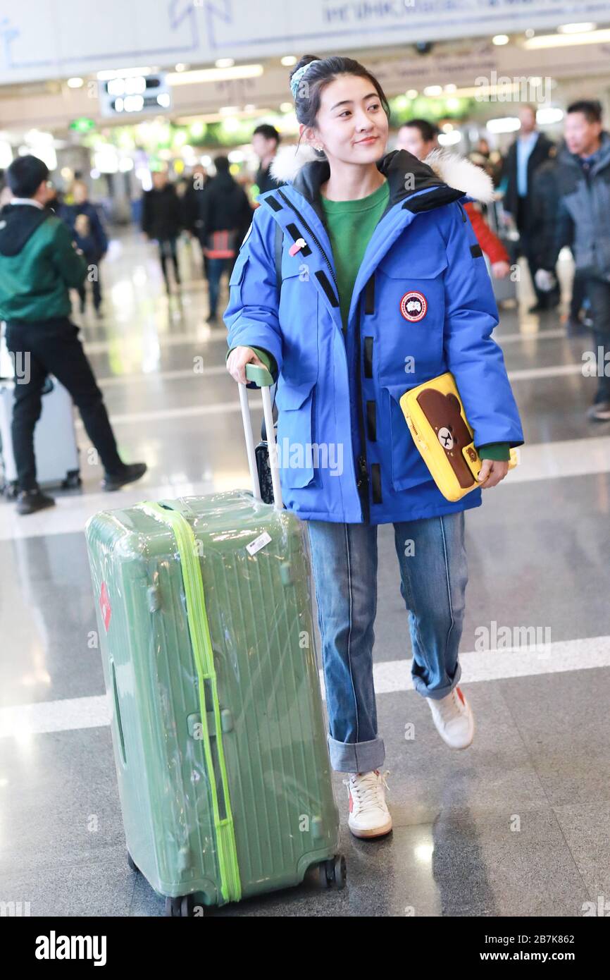 Chinese actress Liang Jie arrives at a Beijing airport after landing in ...