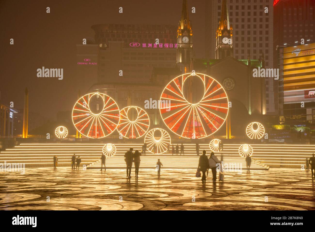 Citizens enjoy the light sculpture called 'eye of the city,' which is ...