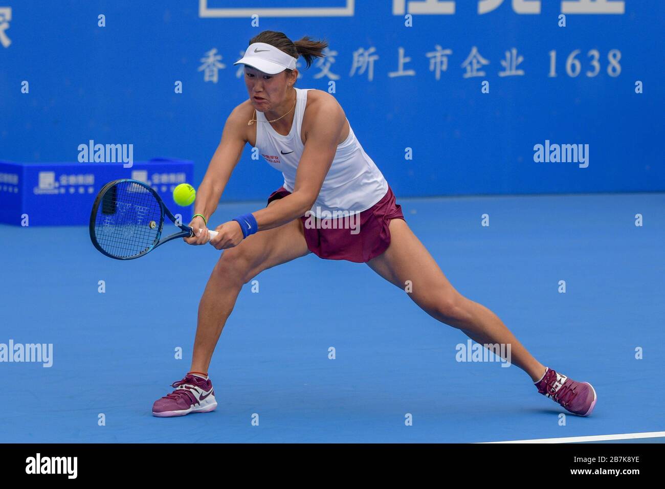 Chinese professional tennis player Wang Xiyu competes against Romanian ...