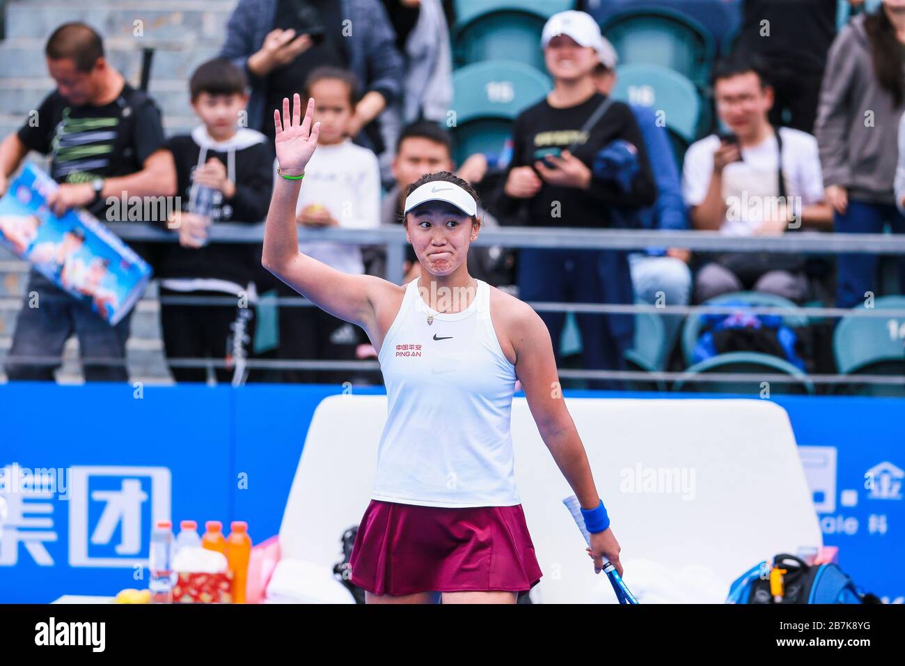 Chinese professional tennis player Wang Xiyu celebrates after defeating ...