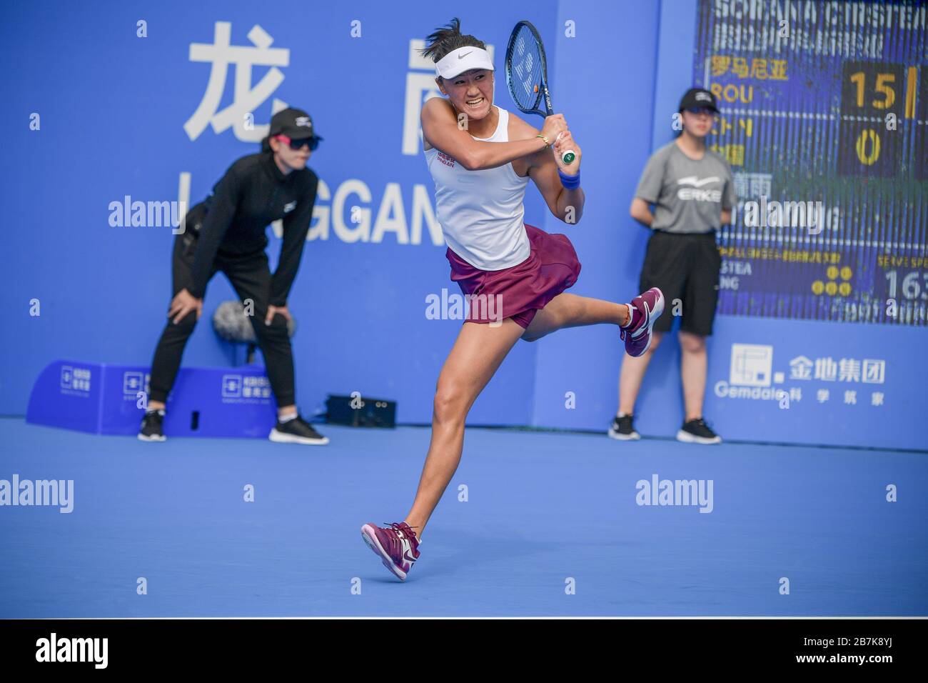 Chinese professional tennis player Wang Xiyu competes against Romanian ...