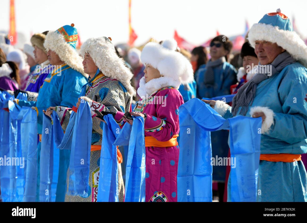 People dance at the opening ceremony of the 13th Dalinur River Winter ...